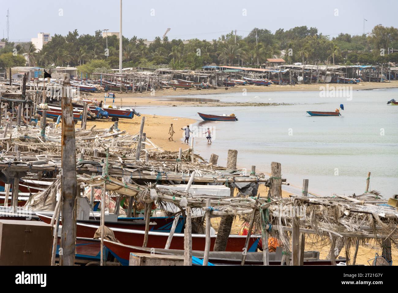 Chabahar, Iran - August 10 2023: Fishing boats on the beach in the port ...