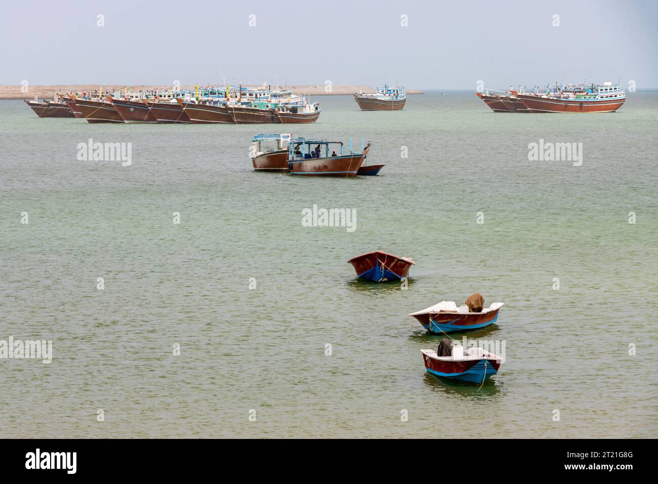 Chabahar, Iran - August 10 2023: Fishing boats on the beach in the port ...