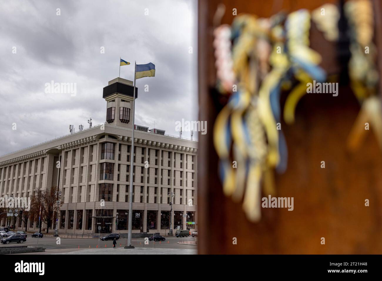 Ukrainian flags are seen flying in the sky on top of the buildings at ...