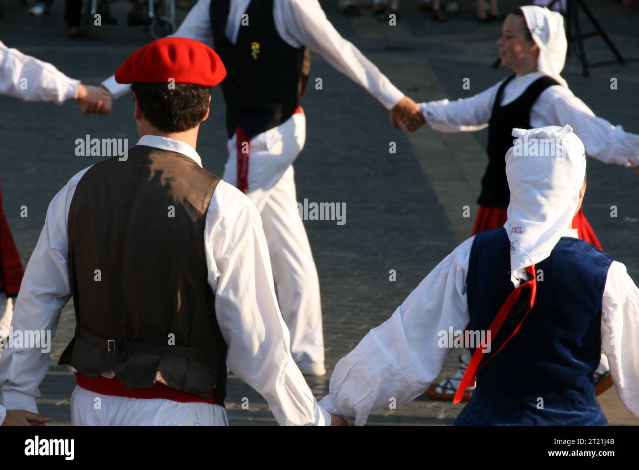 The Basque folk dancers performing on the street Stock Photo - Alamy