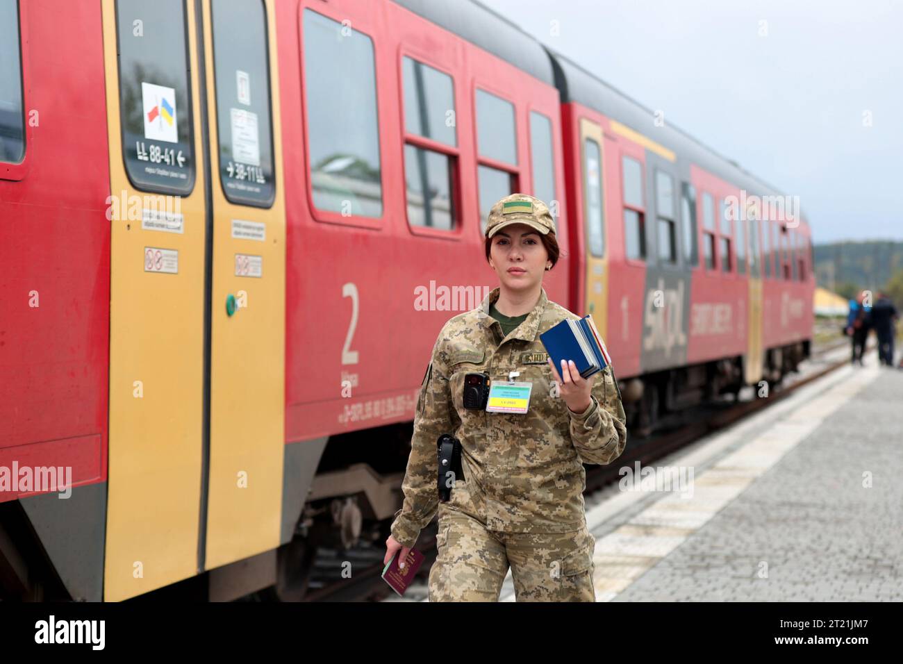 RAVA-RUSKA, UKRAINE - OCTOBER 15, 2023 - A border guard carries ...