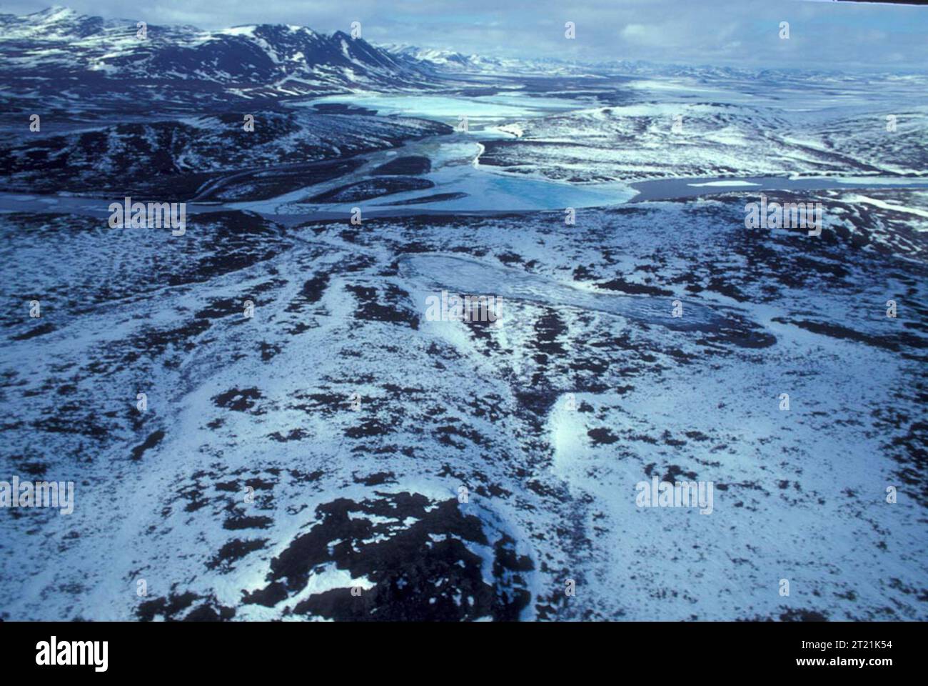This aerial view shows the winding Noatak River, located in the Noatak ...