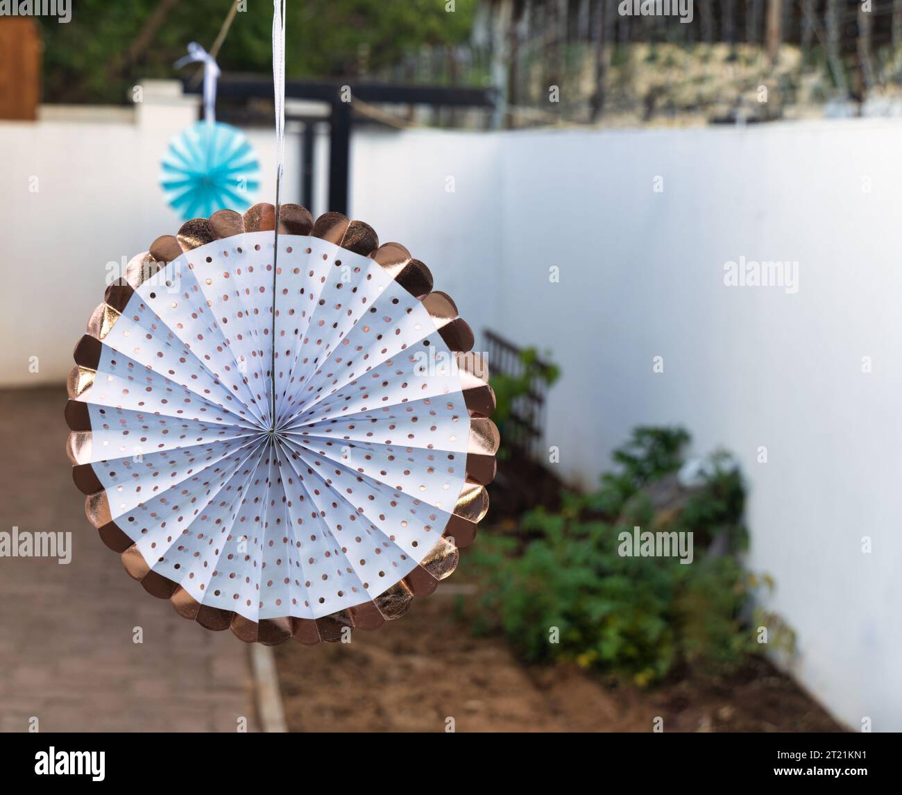 party decorations outdoors, paper gold and while, round disk shape ...