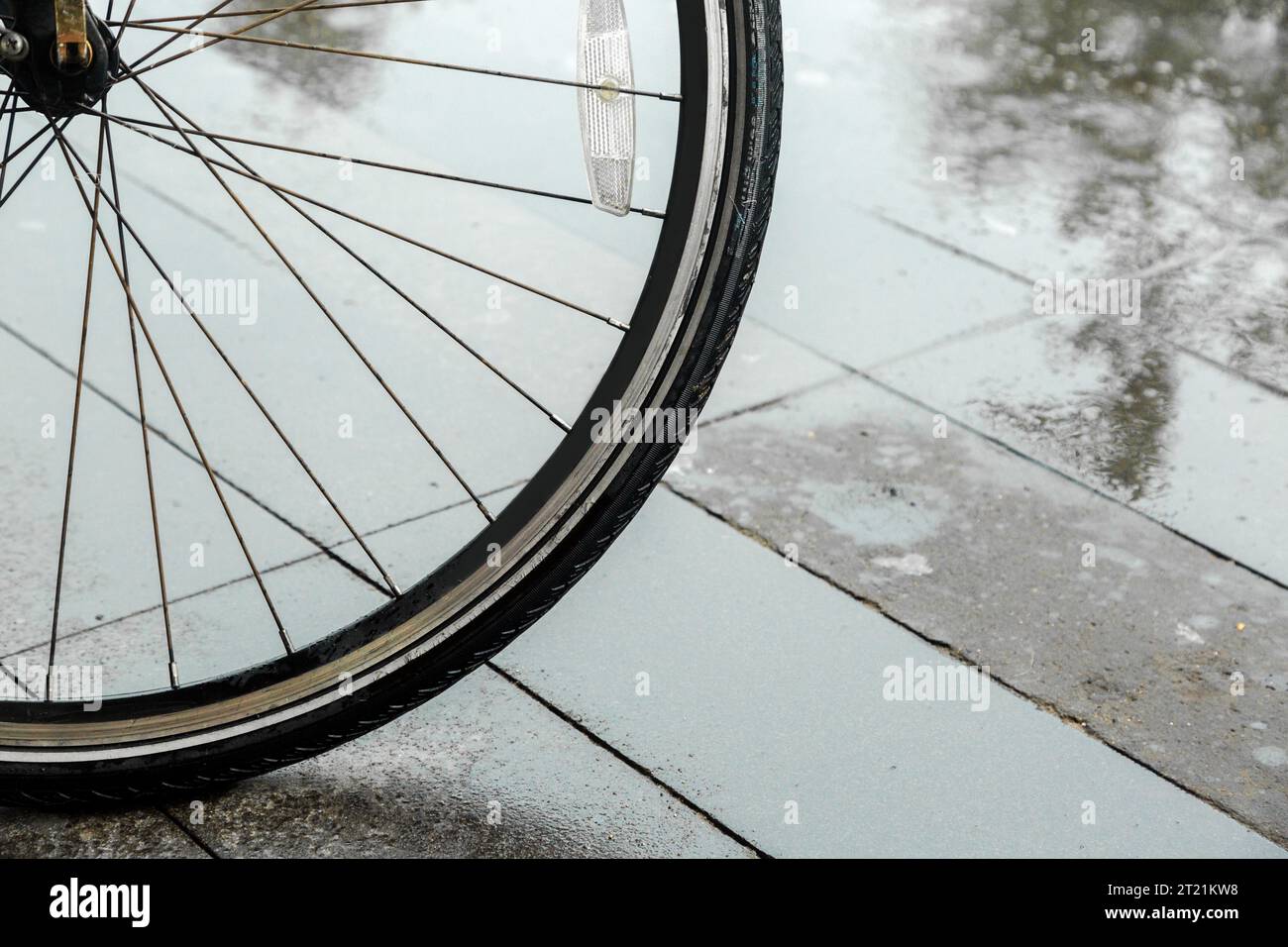 Wet sidewalk bicycle hi-res stock photography and images - Alamy