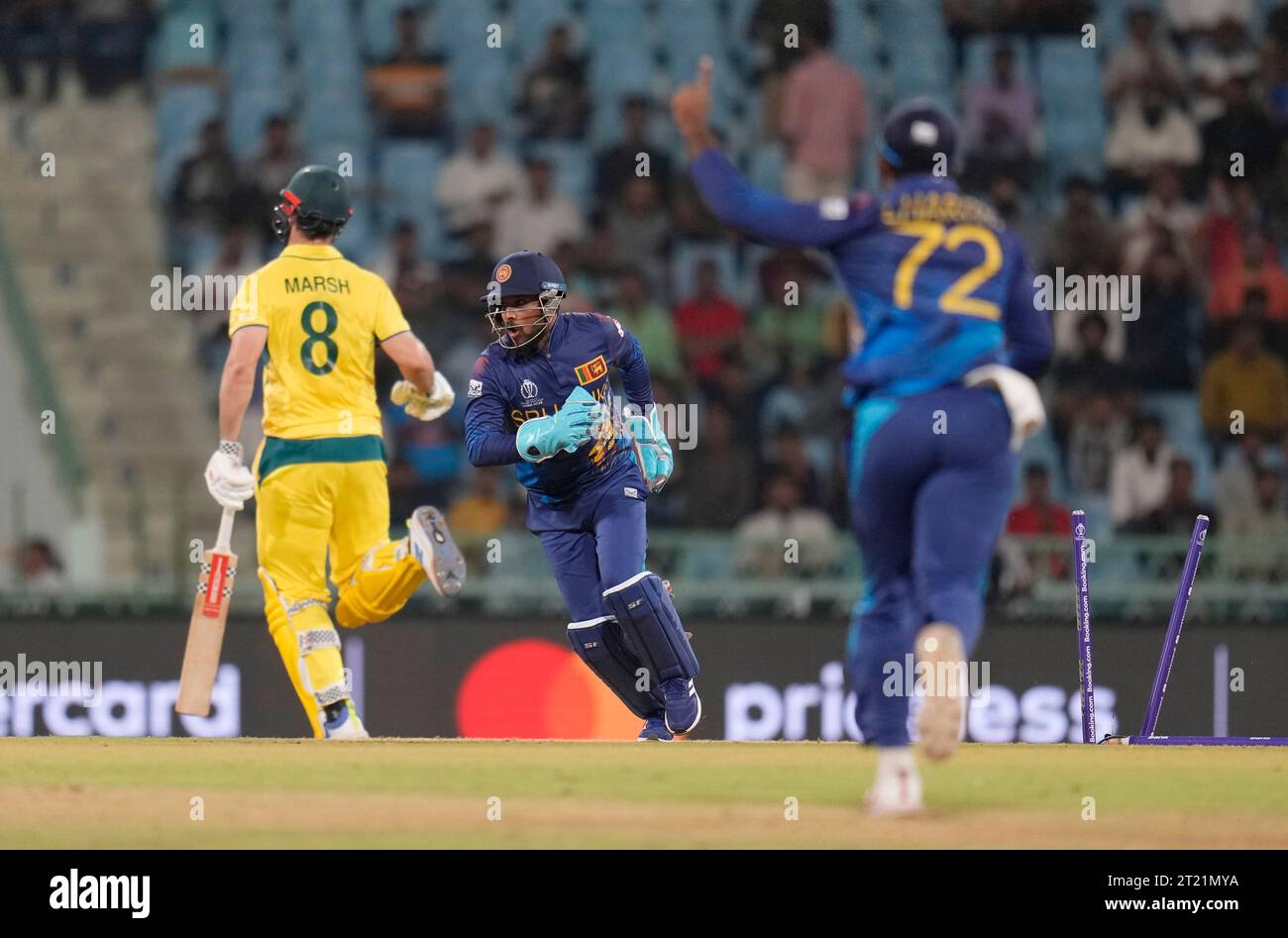 Sri Lankan players celebrate the wicket of Australia's Mitchell Marsh ...