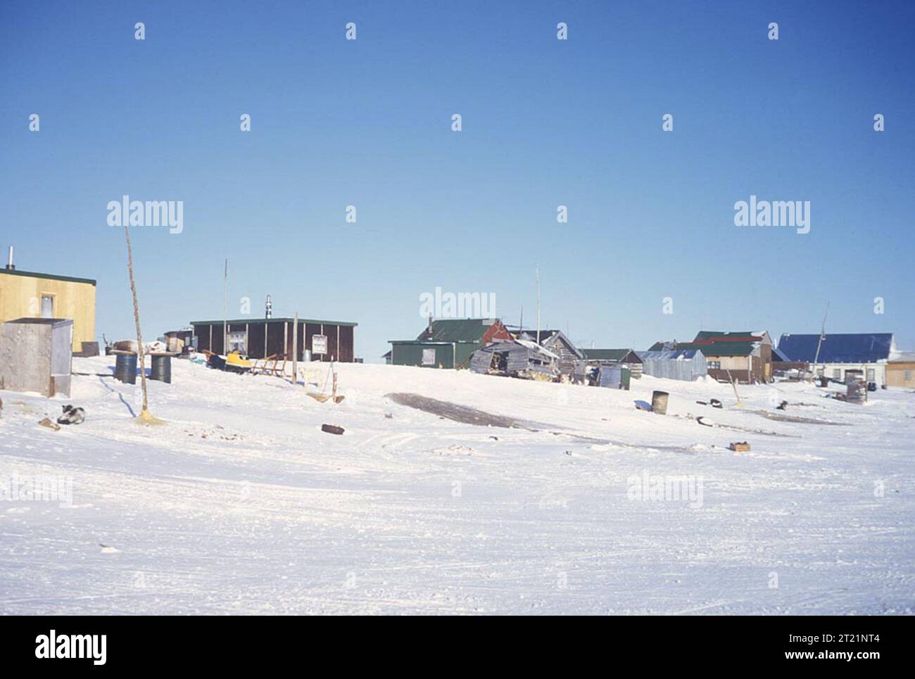 Homes and buildings along the riverfront in Selawik Village, Alaska ...