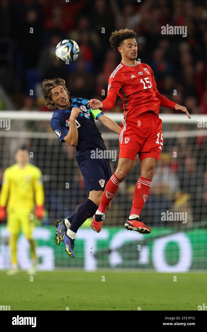 Cardiff, UK. 15th Oct, 2023. Luka Modric of Croatia (l) and Ethan ...