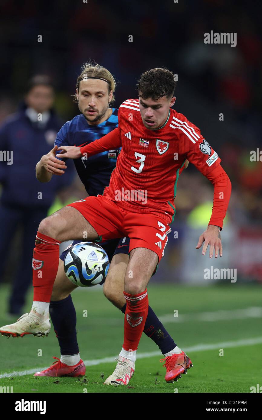 Cardiff, UK. 15th Oct, 2023. Neco Williams of Wales holds off Lovro ...