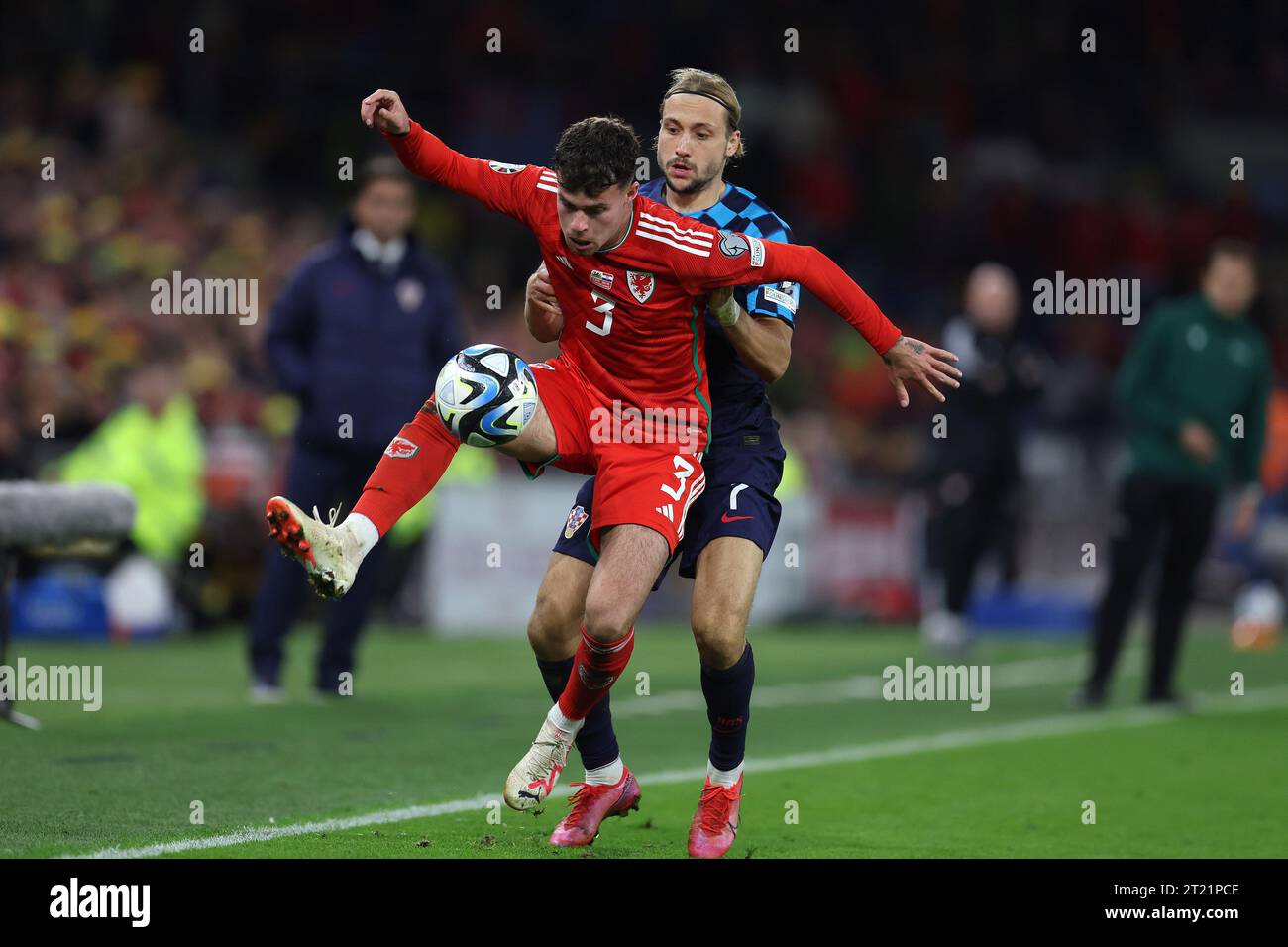 Cardiff, UK. 15th Oct, 2023. Neco Williams of Wales holds off Lovro ...