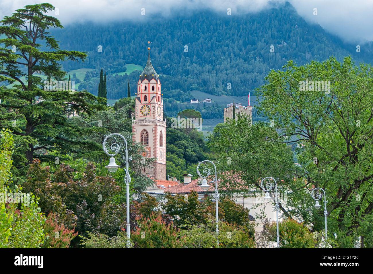 A scenic view of a picturesque church, nestled in the lush green ...