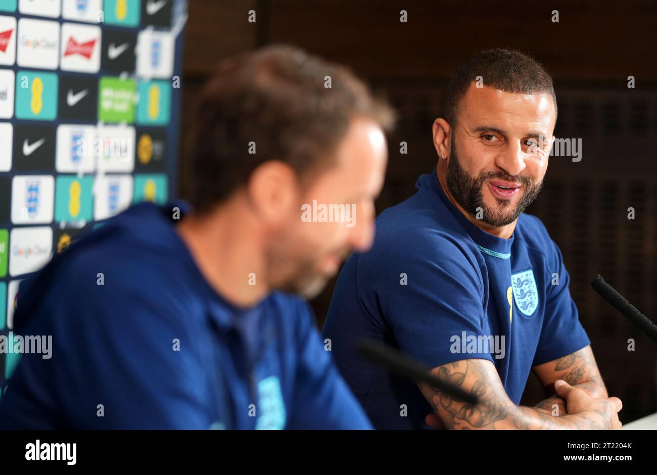 England's Kyle Walker with manager Gareth Southgate during a press ...