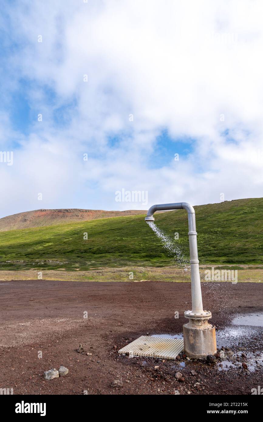 Hot spring shower from geothermal power at Krafla, in the middle of ...