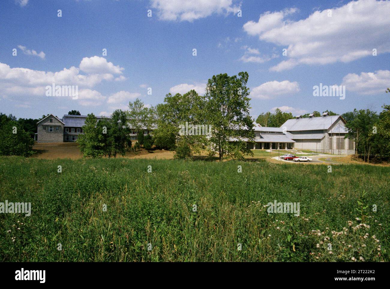 View of the Main Entry building from across green grass field at the ...
