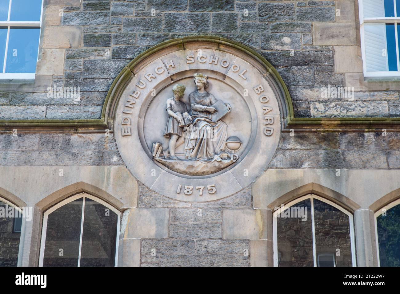 Stone relief carving on the wall of the Dean School building, Dean ...