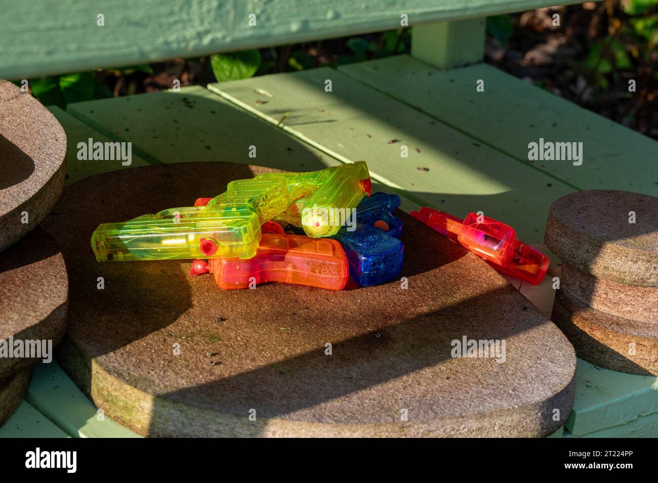 Colorful plastic water guns hi-res stock photography and images - Alamy