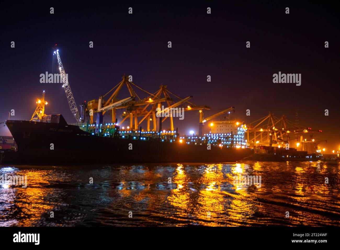 Night view of Chittagong Port. It is the main seaport of Bangladesh ...