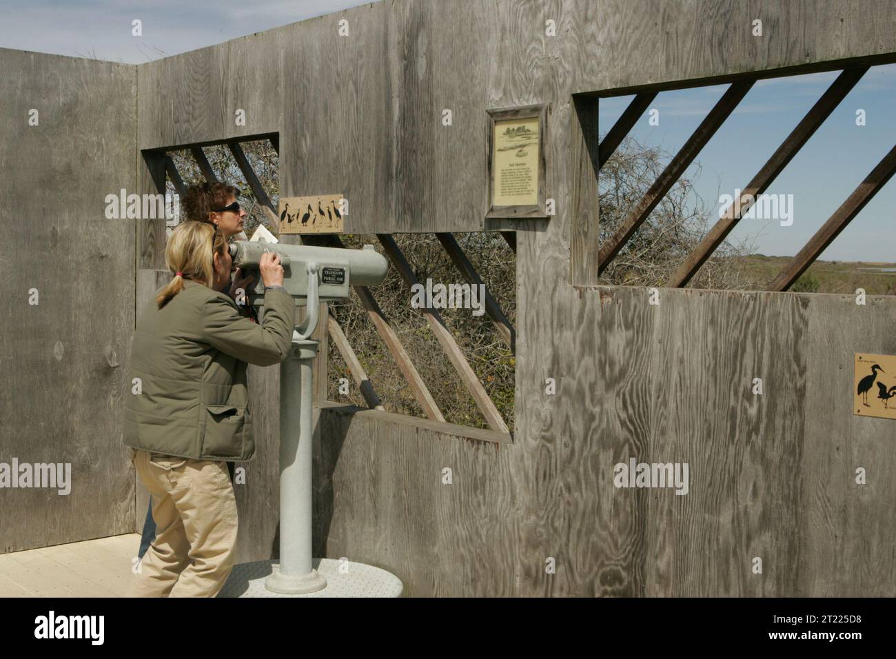 Visitors using a spotting scope from a blind to view their favorite ...