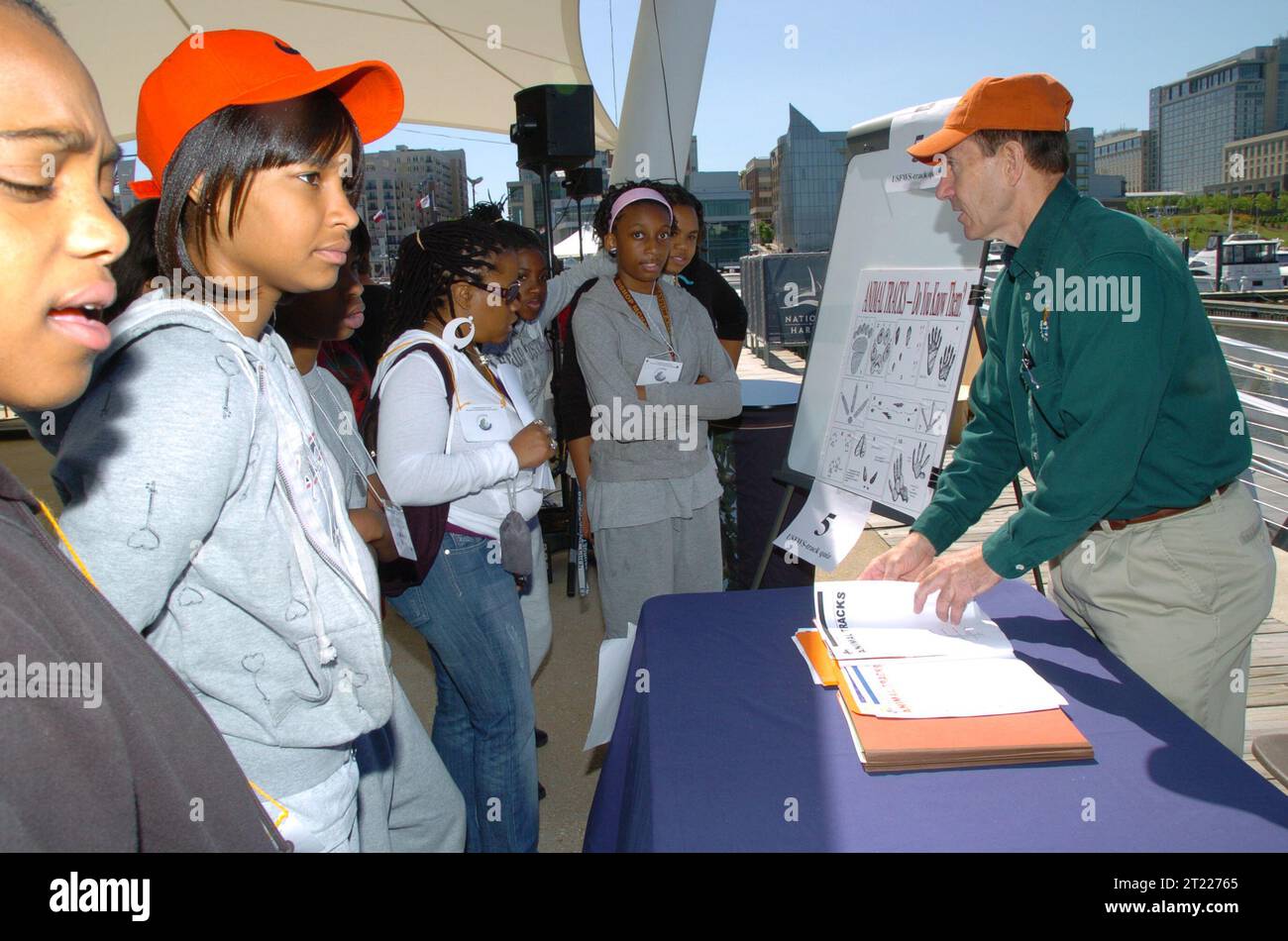 An FWS employee talks to students at the 2009 Nation's River Bass ...