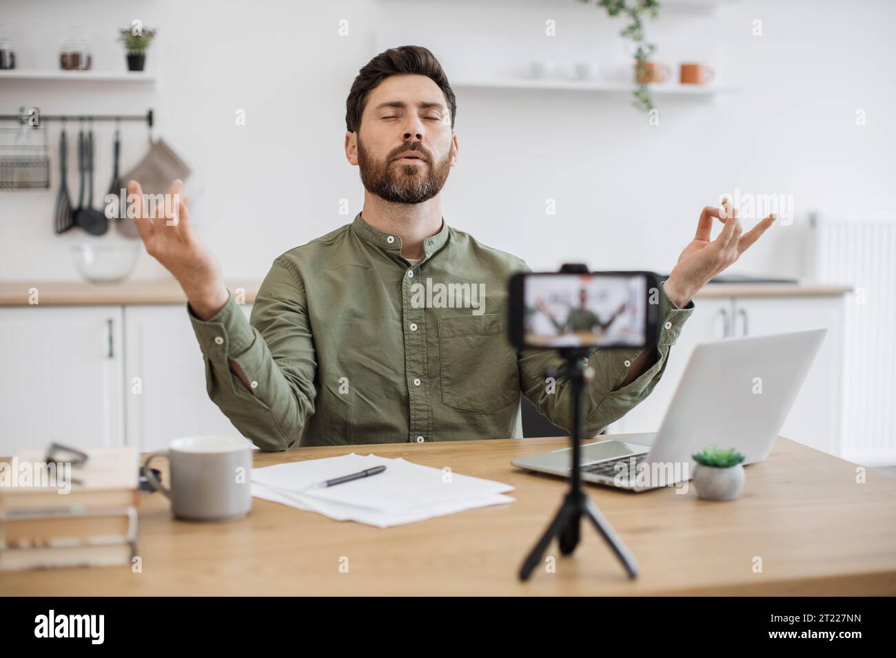 Concentrated bearded vlogger sitting hi-res stock photography and ...