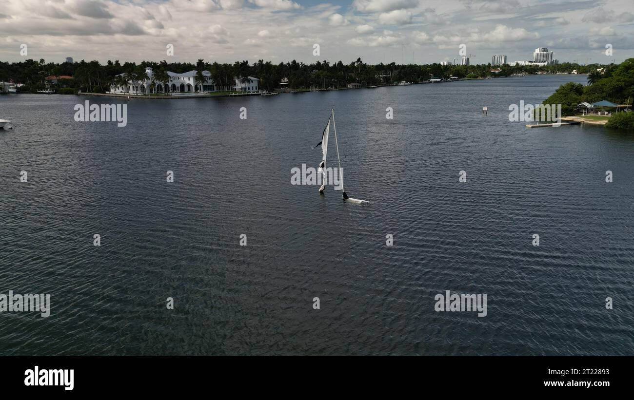 Aerial view of sinking ship. Partially submerged boat Stock Photo - Alamy