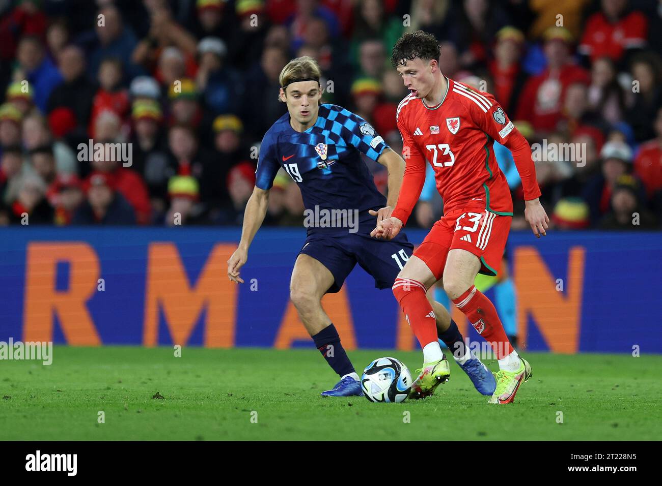 Cardiff, UK. 15th Oct, 2023. Nathan Broadhead of Wales (23) and Boma ...