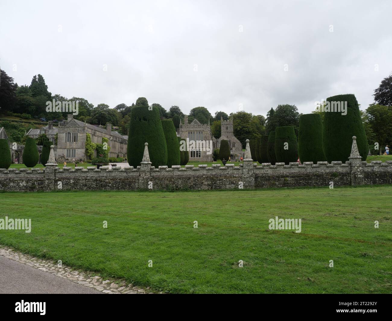 View of the estate and surrounding wall of Lanhydrock manor house in ...