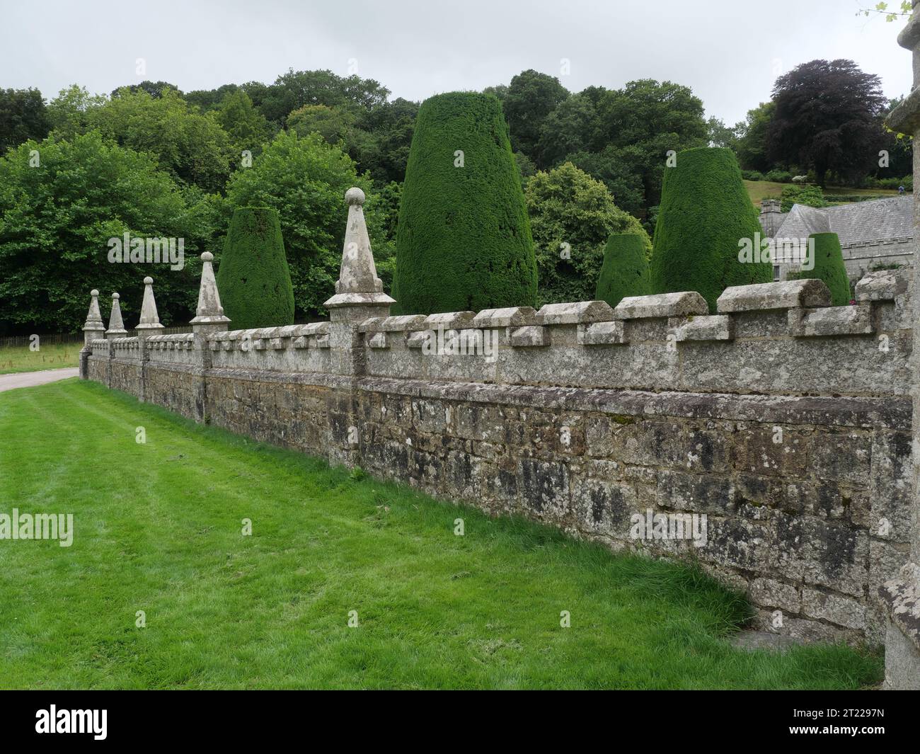 View of the estate and surrounding wall of Lanhydrock manor house in ...