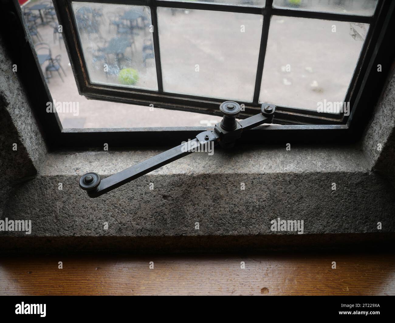 Old mechanism for locking a window in the Victorian manor house of ...