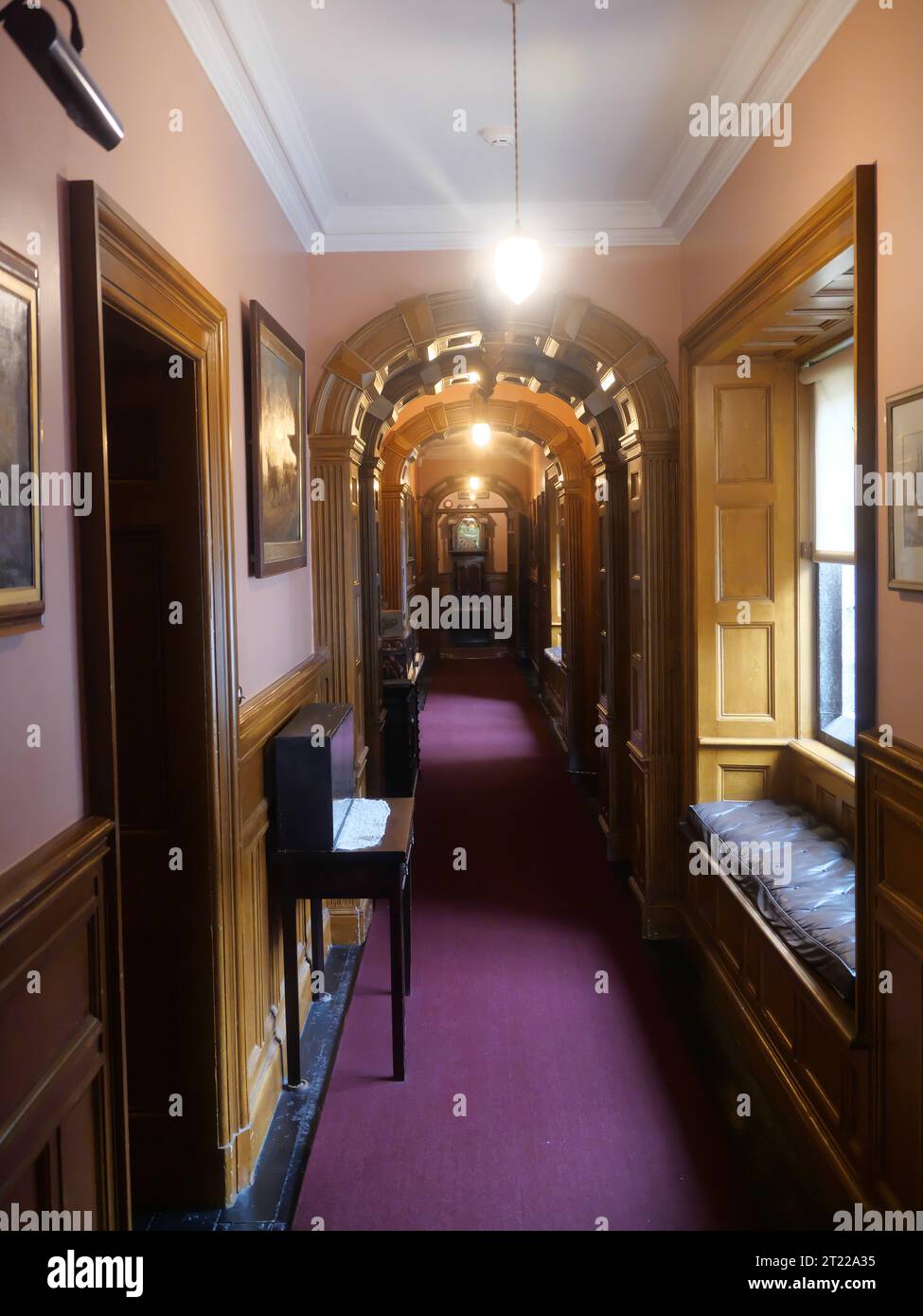 Hallway with lighting Victorian manor house of Lanhydrock in Cornwall ...