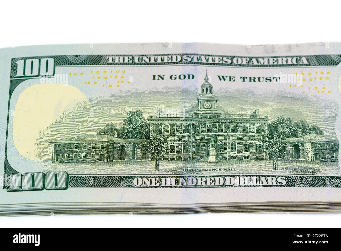a stack of 100 dollar bills on a white background studio shooting 13 ...
