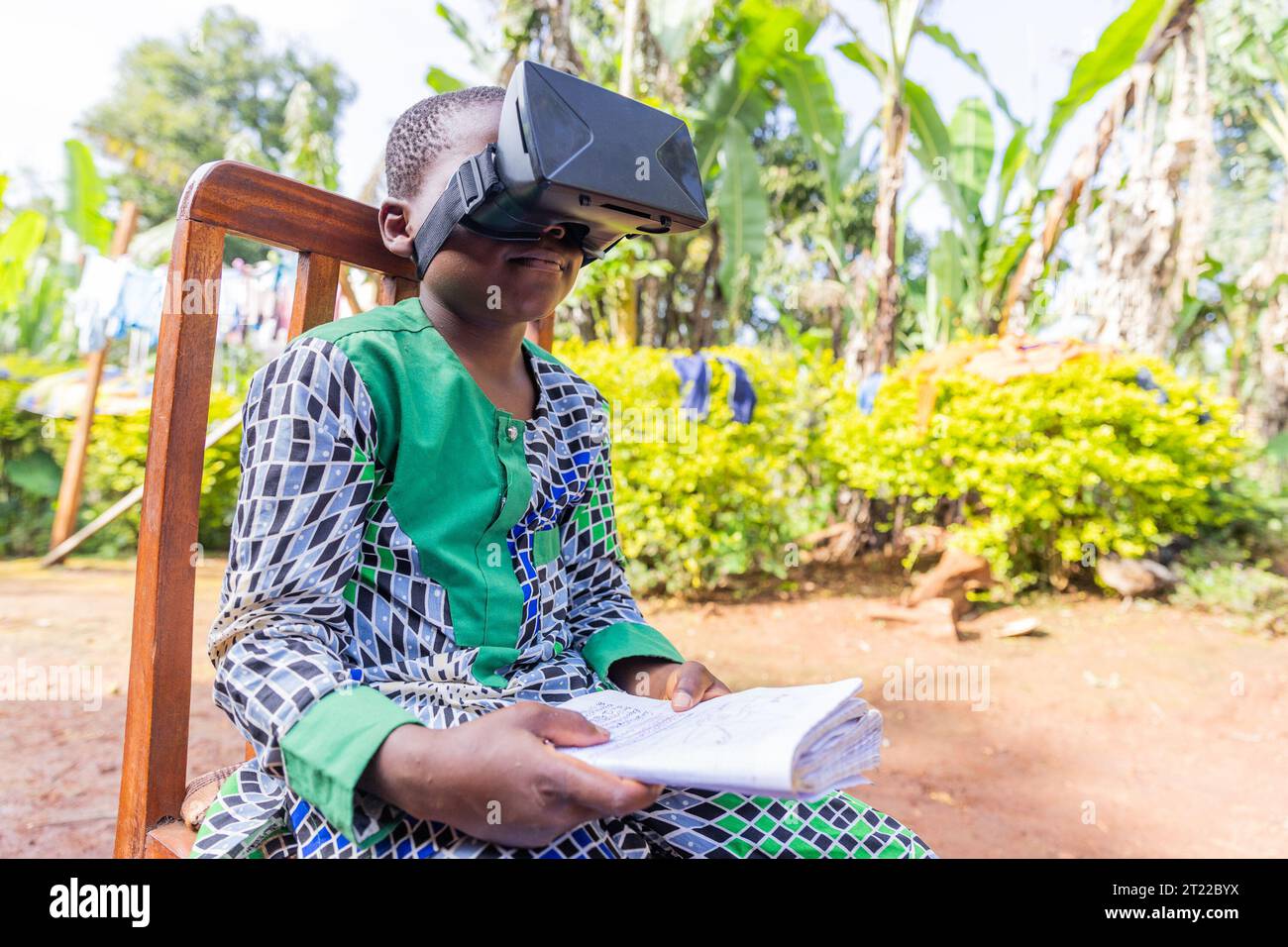 An African child does homework using an augmented reality viewer ...