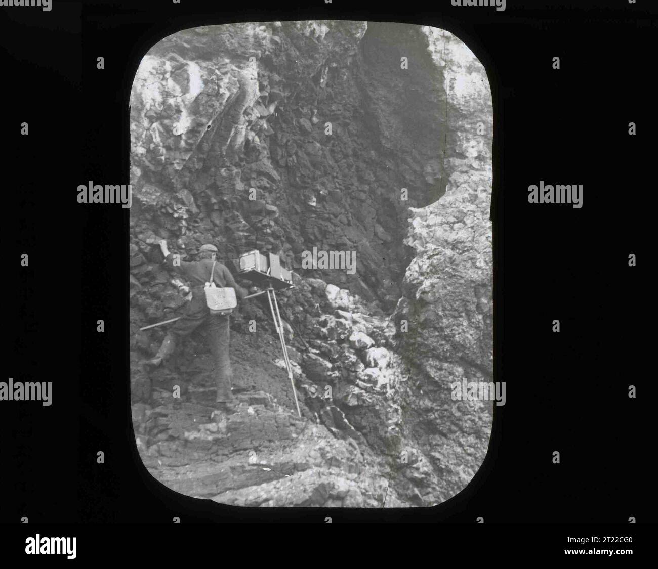 Photograph of Bohlman climbing the cliffs at Three Arch Rocks, Oregon ...