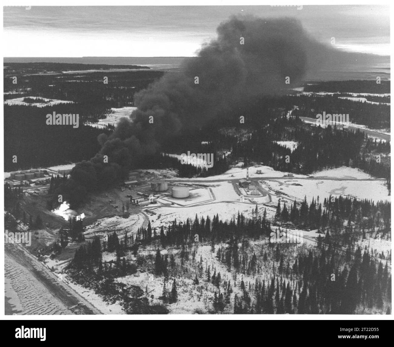 Black and white aerial view of Trading Bay, Cook Inlet as sump pit is ...