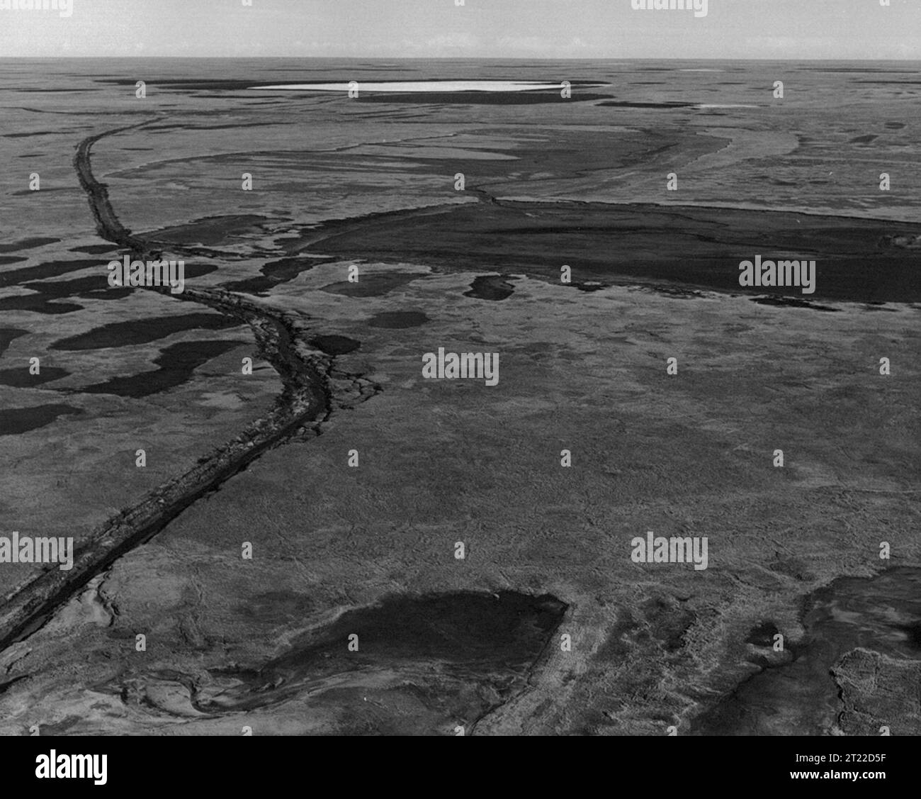 Aerial view. This channel was created by movement of vehicles during ...