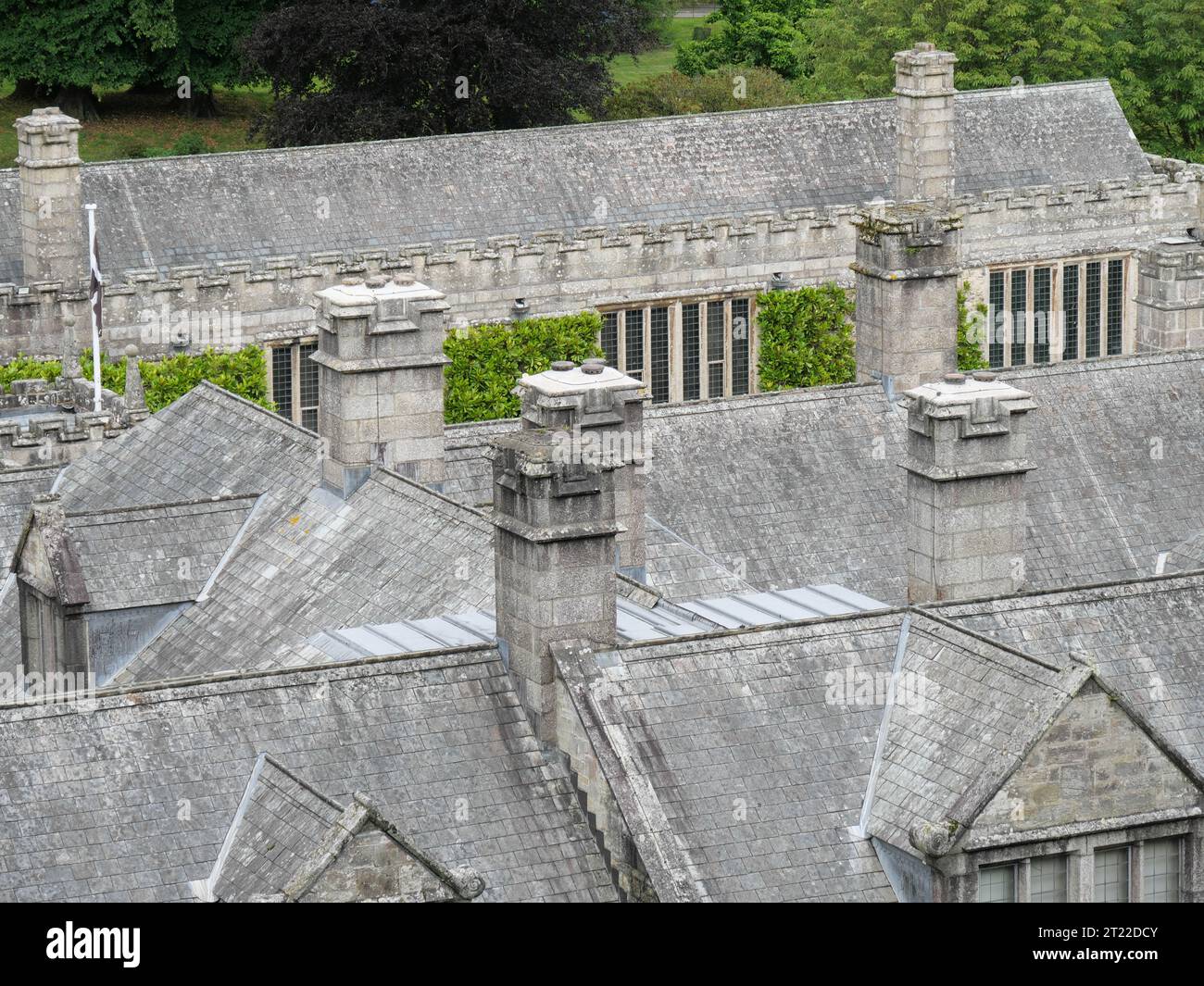 View from above the chimneys and roofs of Lanhydrock manor house in ...
