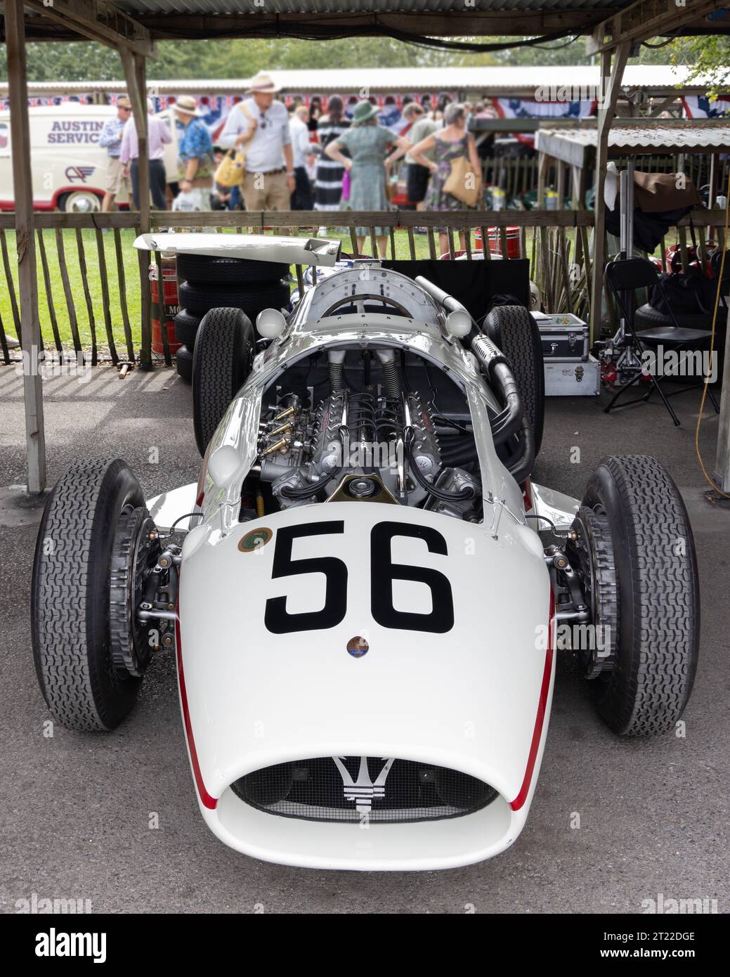 A 1956 Maserati 250F Formula One racing car in the pits at the 2023 ...