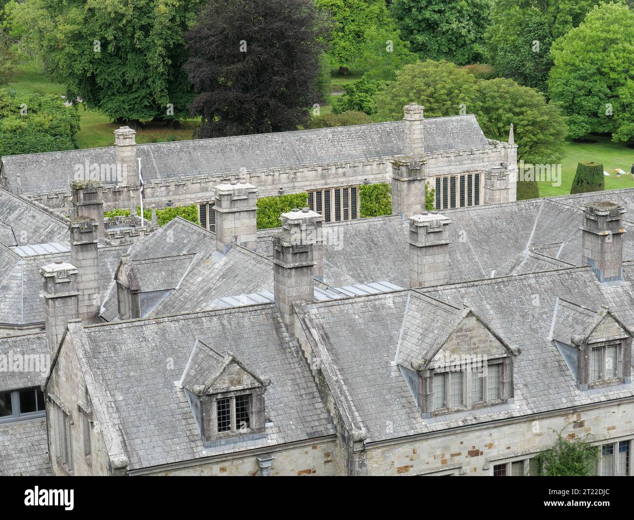 View from above the chimneys and roofs of Lanhydrock manor house in ...