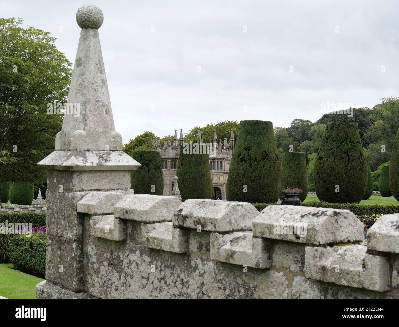 View of the estate and surrounding wall of Lanhydrock manor house in ...