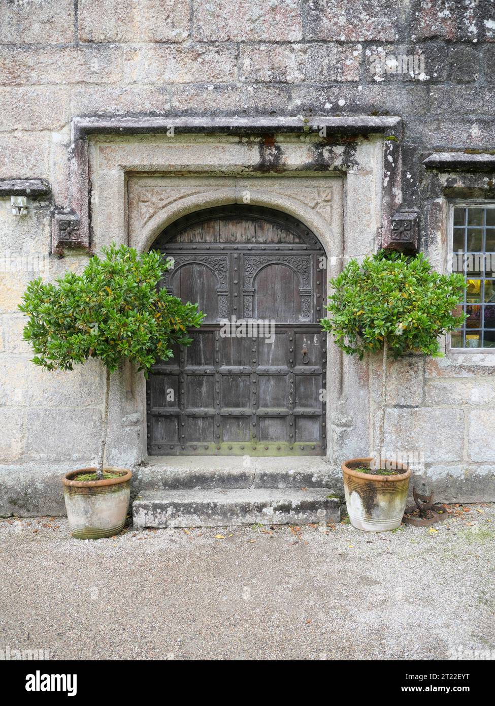 Historic entrance gate of Lanhydrock manor house in Cornwall England ...