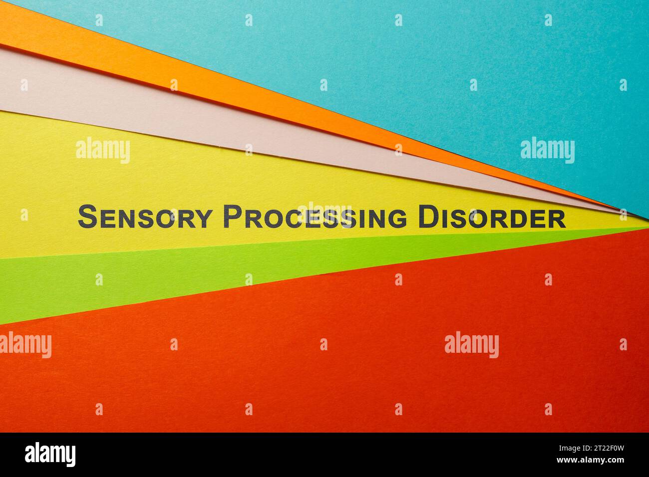 Sheets of colored paper and sign Sensory Processing Disorder SPD Stock ...