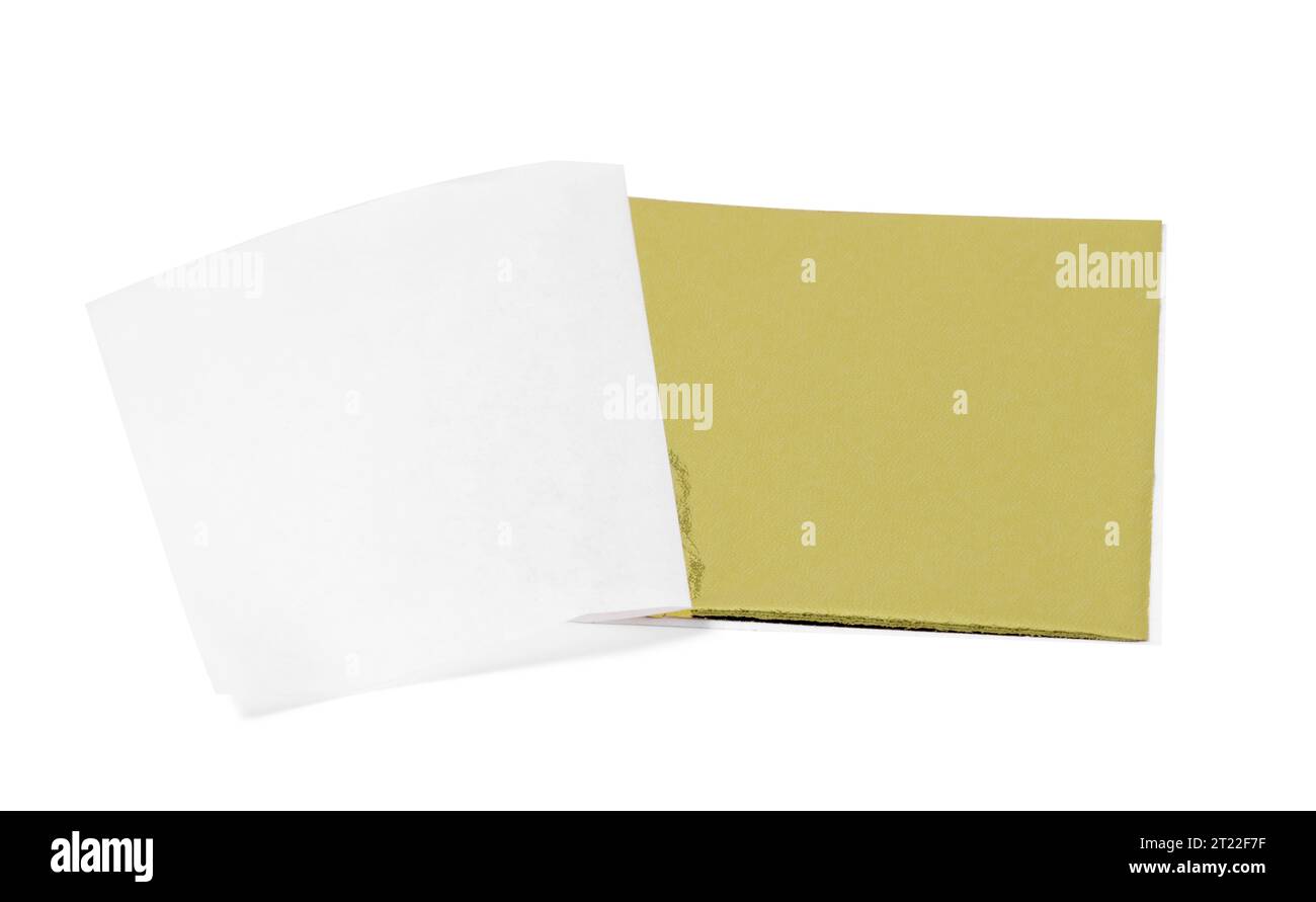 One edible gold leaf sheet isolated on white Stock Photo - Alamy