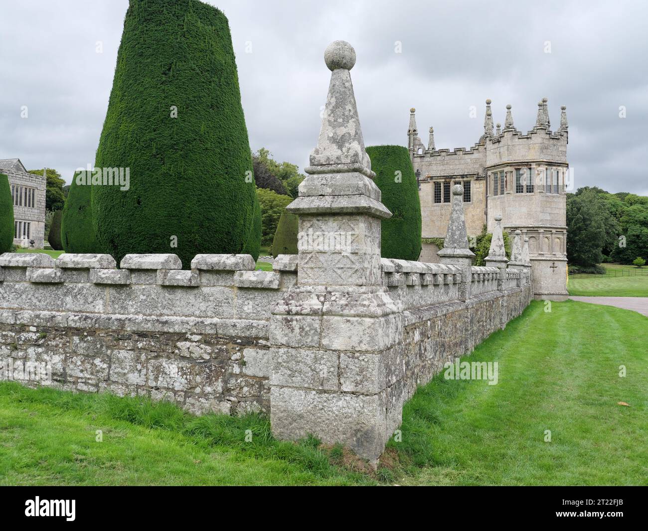 View of the estate and surrounding wall of Lanhydrock manor house in ...