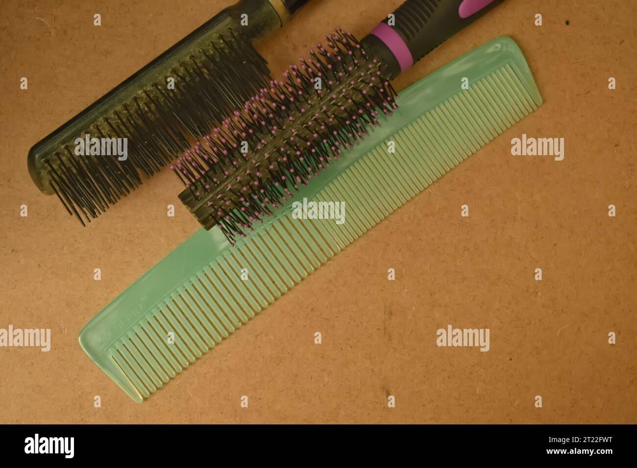 A close picture of various varieties of plastic comb placed on a salon ...