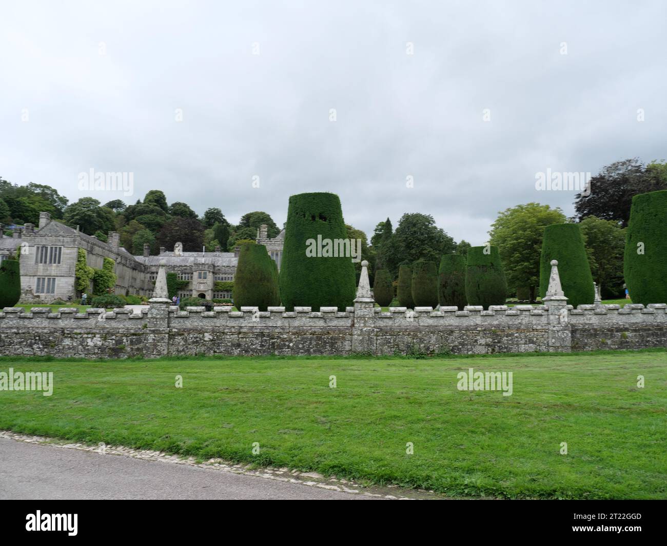 View of the estate and surrounding wall of Lanhydrock manor house in ...