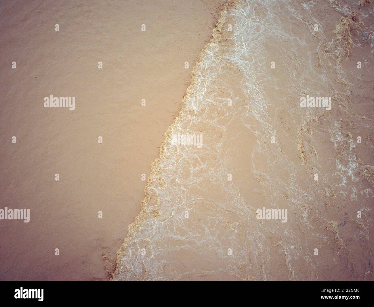 Top down view of current change in Sava river during flooding with ...