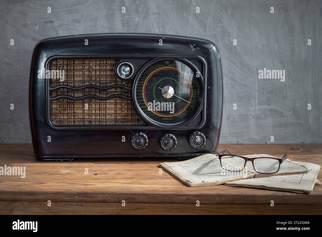 Close up view of vintage workspace with vintage radio and decoration on ...