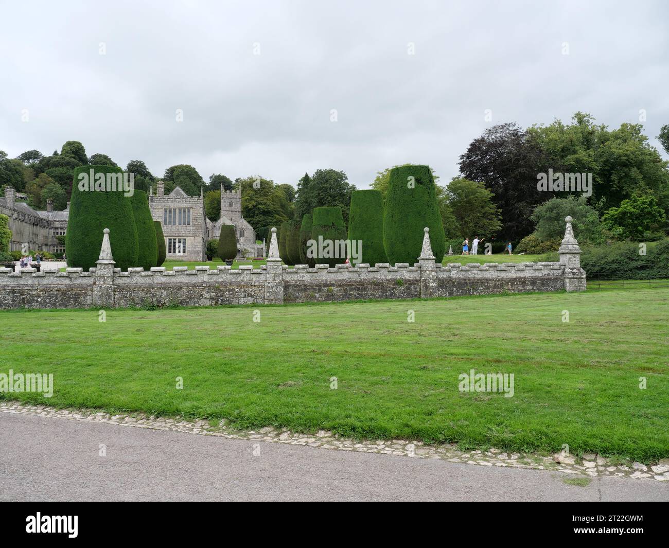 View of the estate and surrounding wall of Lanhydrock manor house in ...