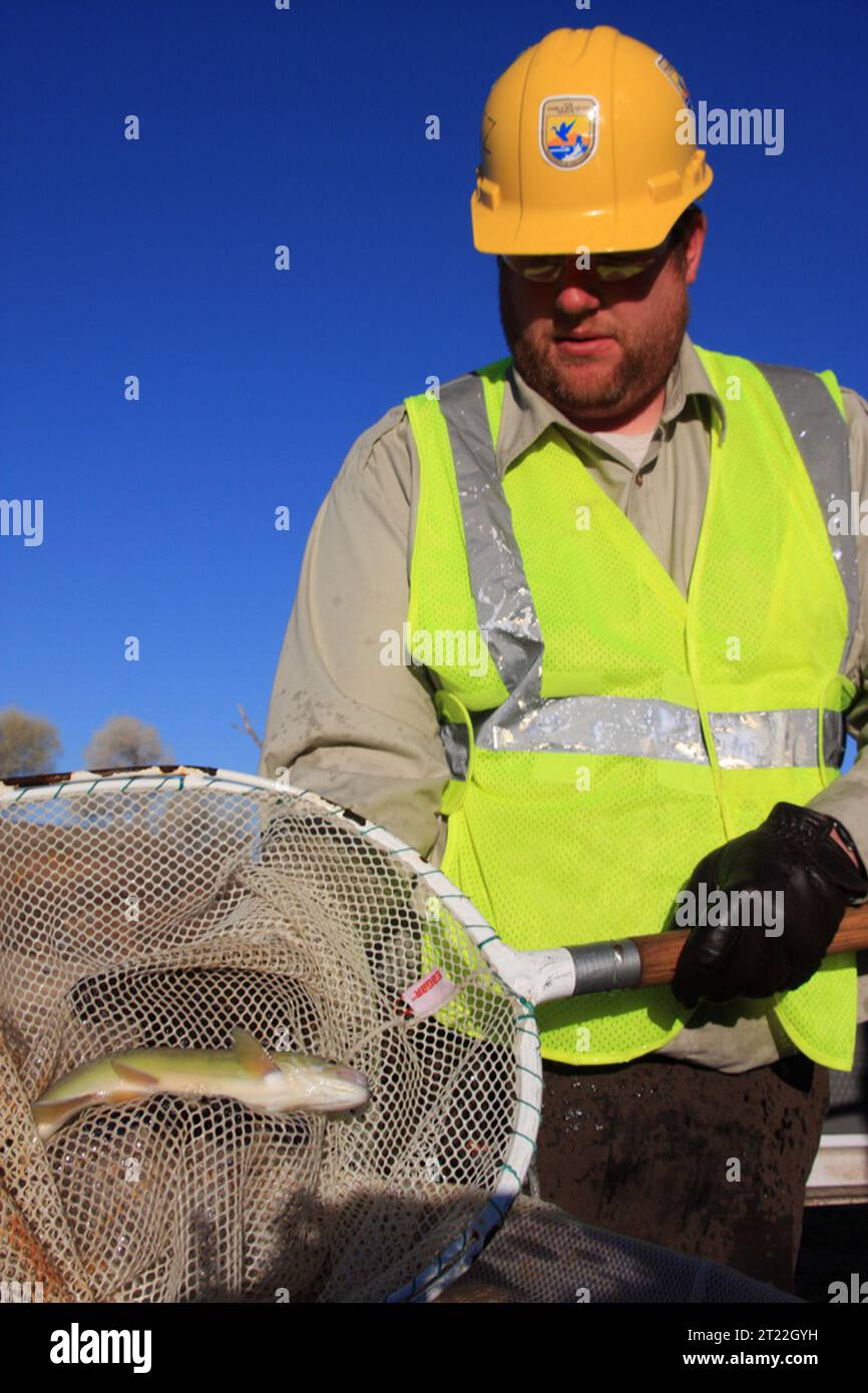 Jeremy Voeltz, a U.S. Fish and Wildlife Service fishery biologist for ...