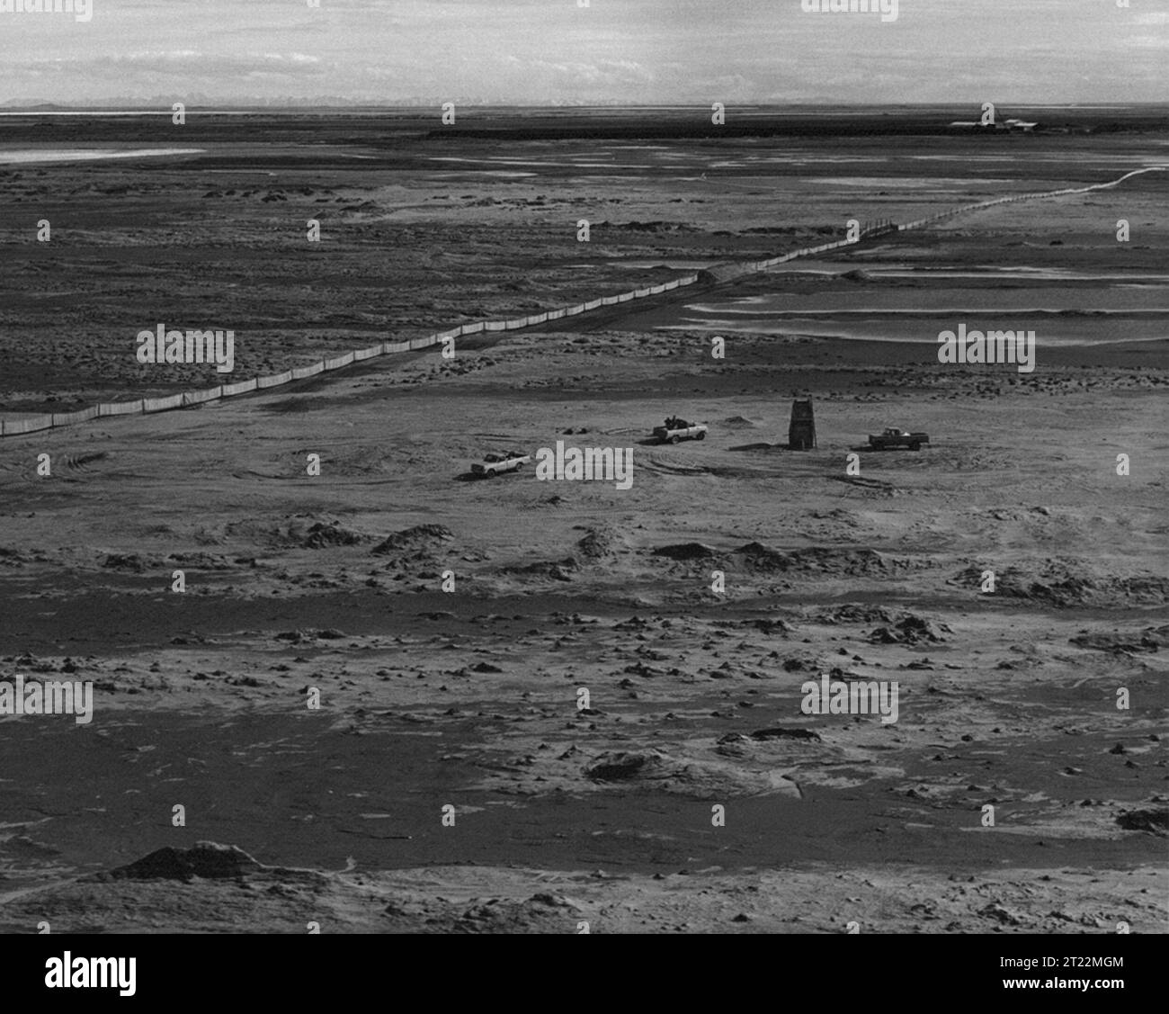 Aerial photo of long fence line running across wide, flat plain ...