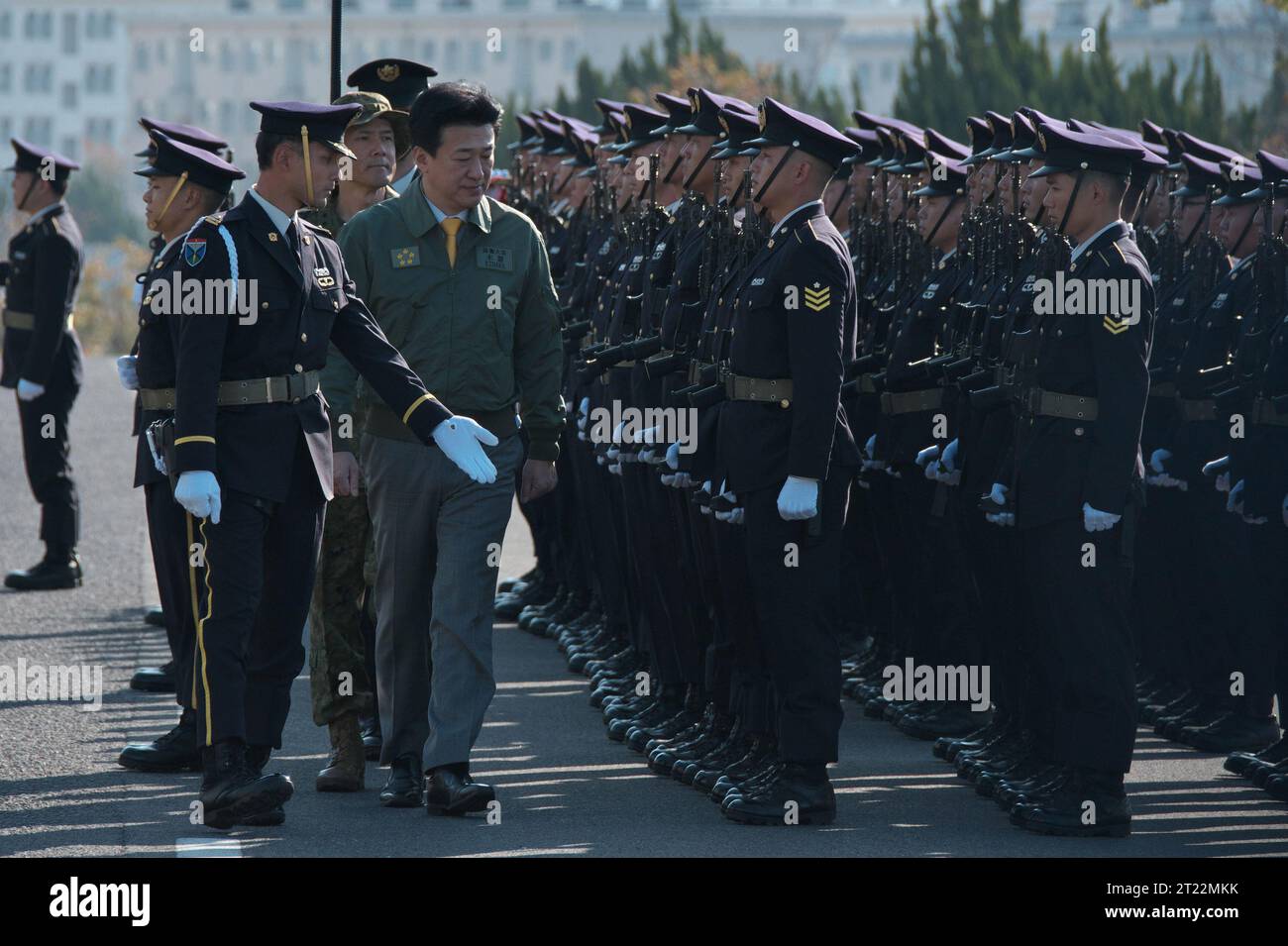 Sasebo, Japan. 16th Oct, 2023. Defense Minister Minoru Kihara receives ...
